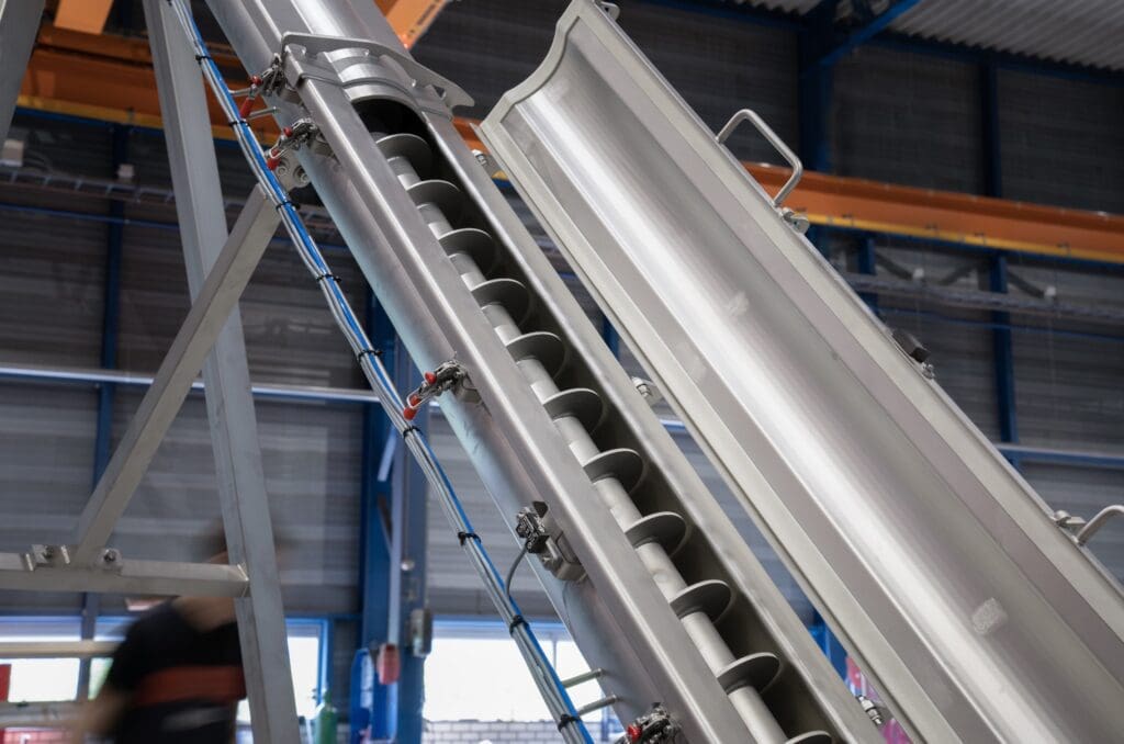 Schroeftransporteur verlegt zijn grenzen - Solids Processing